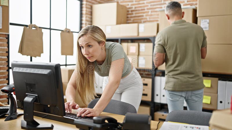 Man and Woman Ecommerce Business Workers Using Computer Working at ...