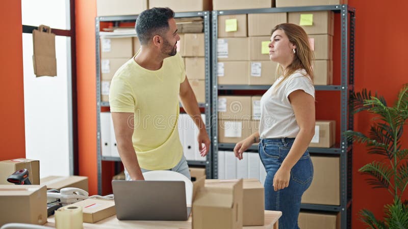 Man and Woman Ecommerce Business Workers Working Hugging Each Other at ...