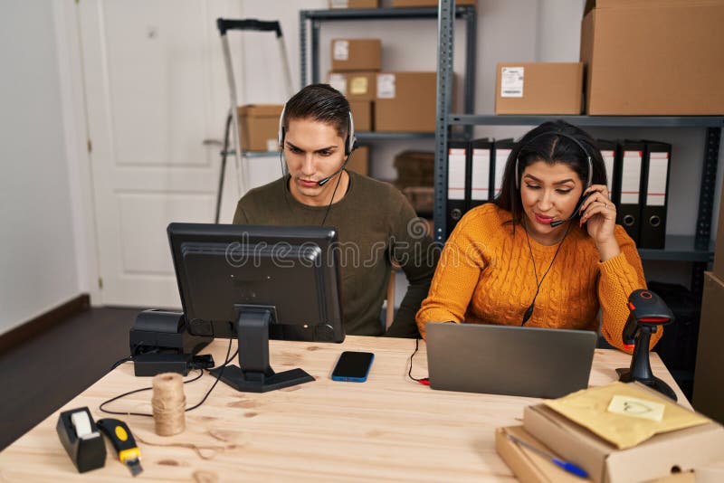 Man and Woman Ecommerce Call Center Agents Working at Ecommerce Office ...