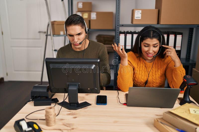 Man and Woman Ecommerce Call Center Agents Working at Ecommerce Office ...