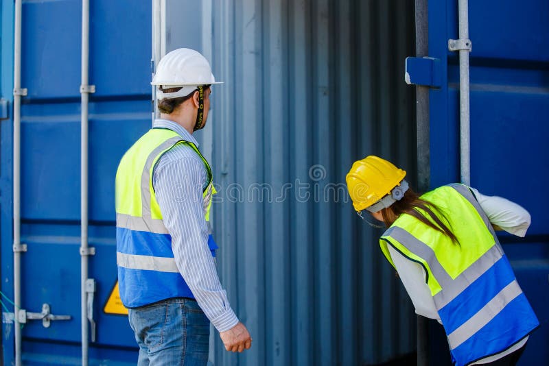 Man and Woman Engineer Worker Open Door of Cargo Containers Worker Then ...