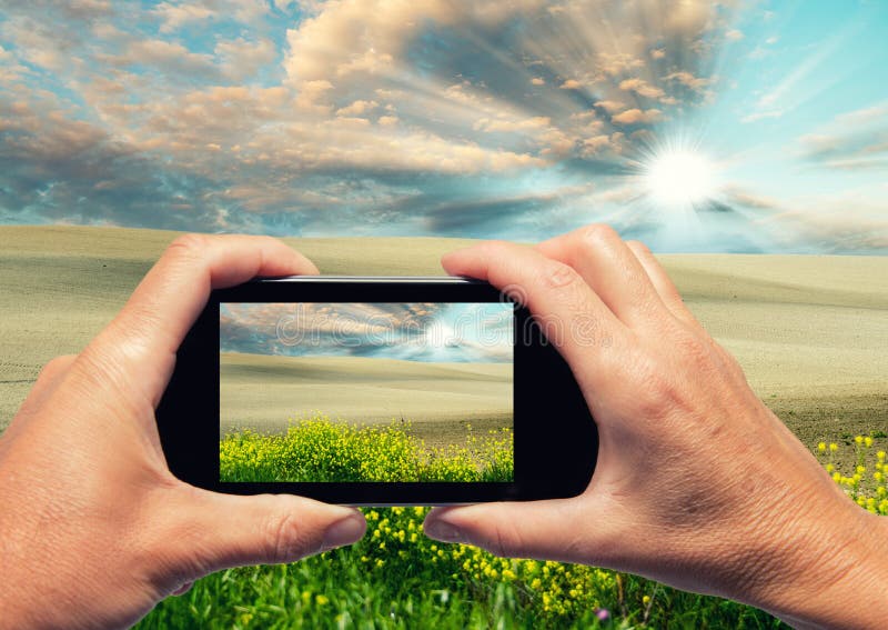 Hand Capturing the Sun stock photo. Image of sunset - 125897814