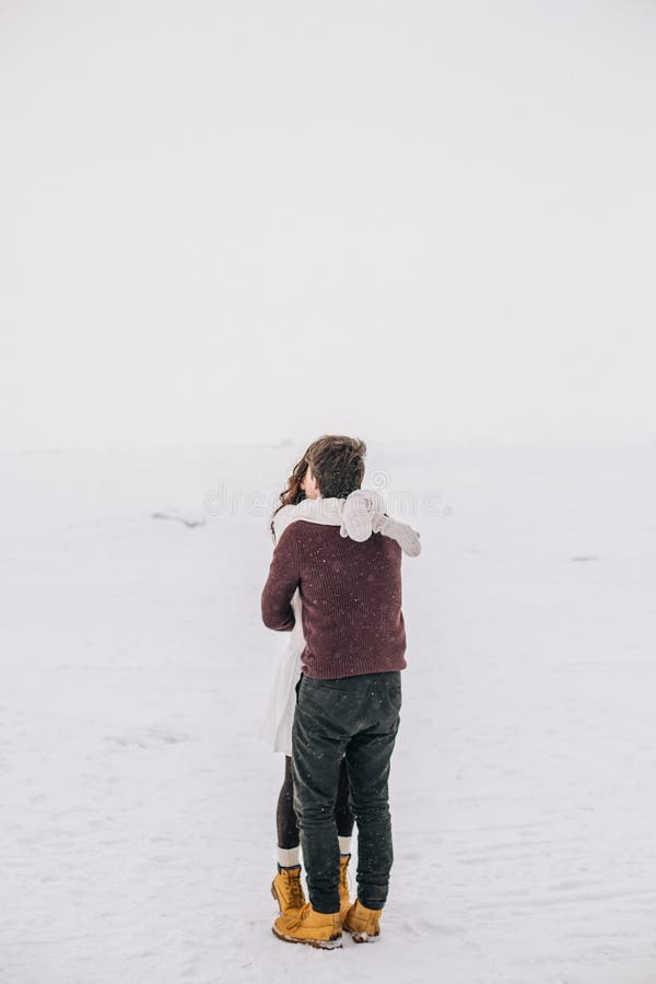 Man And Woman Kissing On Snow Field Picture Image 106174176