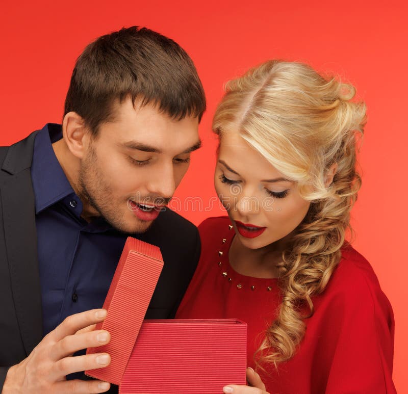 Man and Woman Looking Inside the Gift Box Stock Photo - Image of people ...