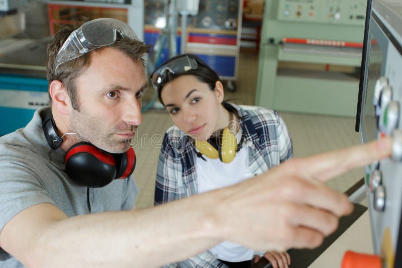 Man and Woman with Machine Cnc Stock Image - Image of production ...
