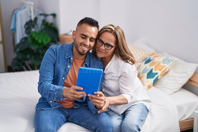 Man and Woman Mother and Son Using Touchpad at Bedroom Stock Image ...