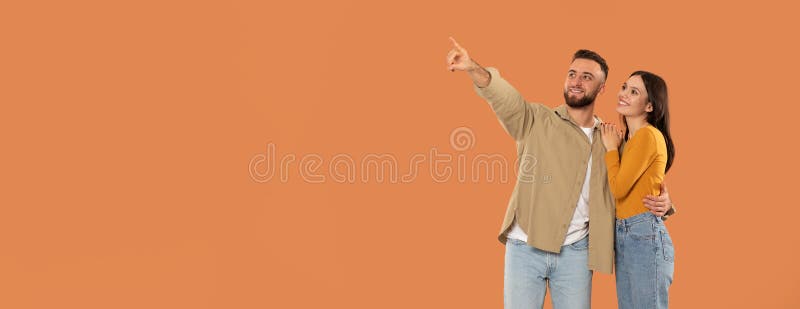 Man and Woman Pointing at Something, Copy Space Stock Image - Image of ...