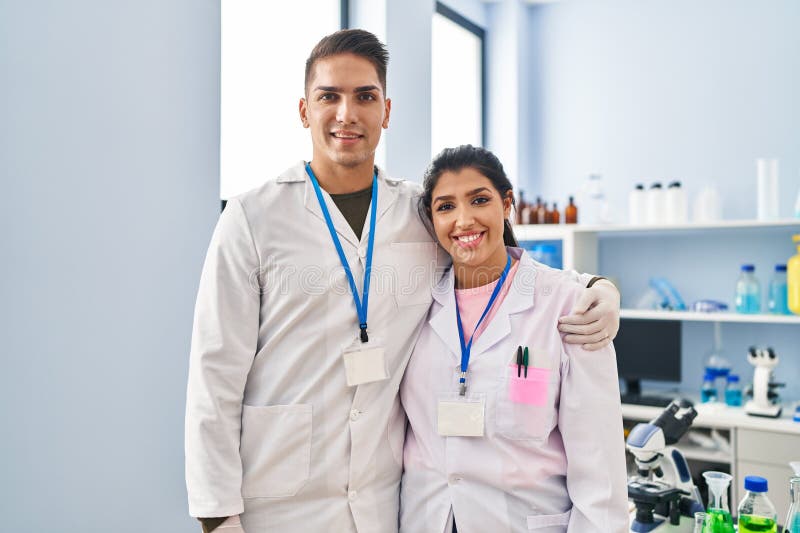 Man and Woman Scientists Partners Hugging Each Other at Laboratory ...