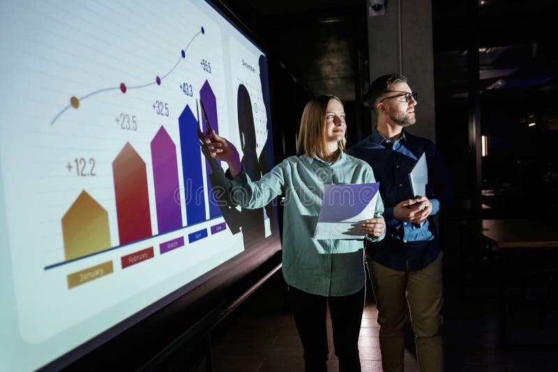 Man Woman Standing Near Projector Business Data Cooperation Stock ...