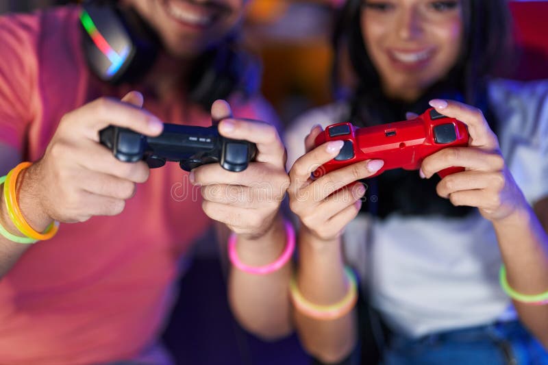 Man and Woman Streamers Playing Video Game Using Computer and Joystick ...