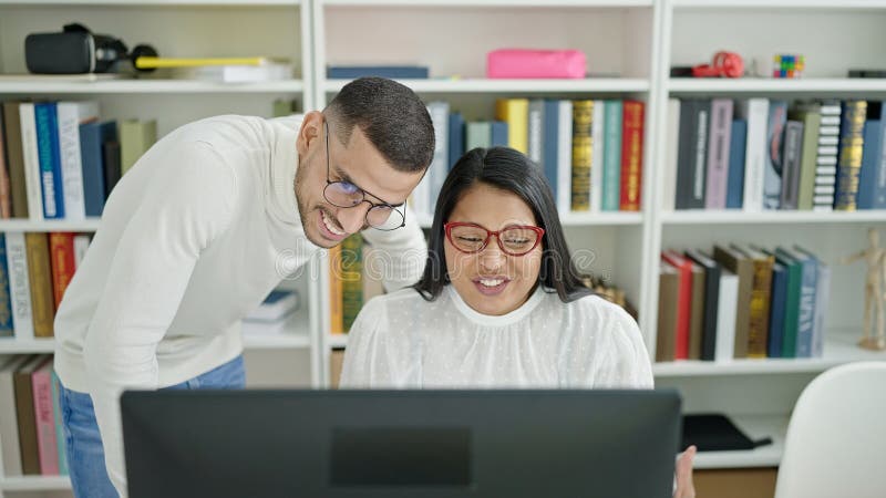 Man and Woman Student and Teacher Using Computer Studying at University ...