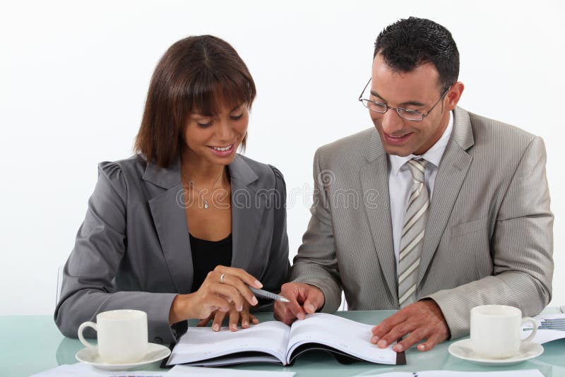 Man and woman studying stock image. Image of guide, enthralled - 37029899