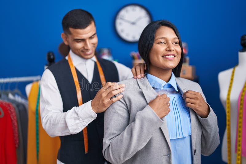 Man and Woman Tailor and Customer Wearing Jacket at Sewing Studio Stock ...