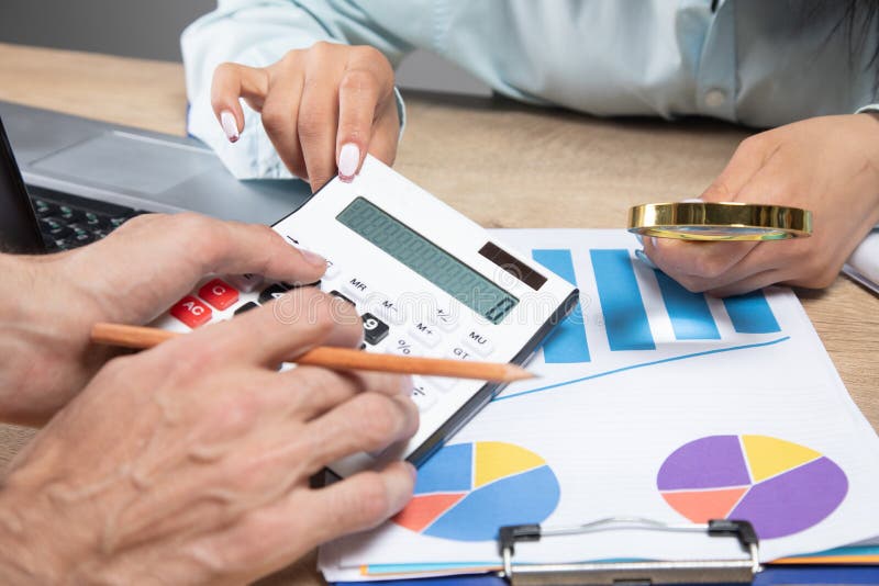 A Man and a Woman Talking about Statistics Stock Image - Image of ...