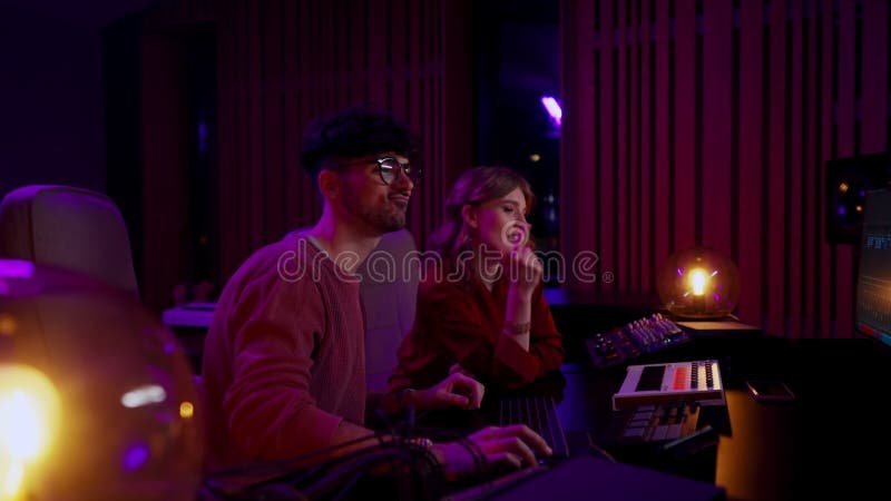 Team of Sound Engineers Working on Recording and Editing Tracks Stock ... Team of Sound Engineers Working on Recording and Editing Tracks Stock ...