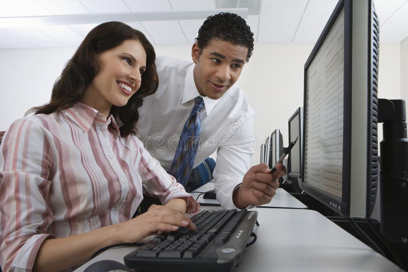 Man and Woman Using Computer Stock Photo - Image of colleague, black ...