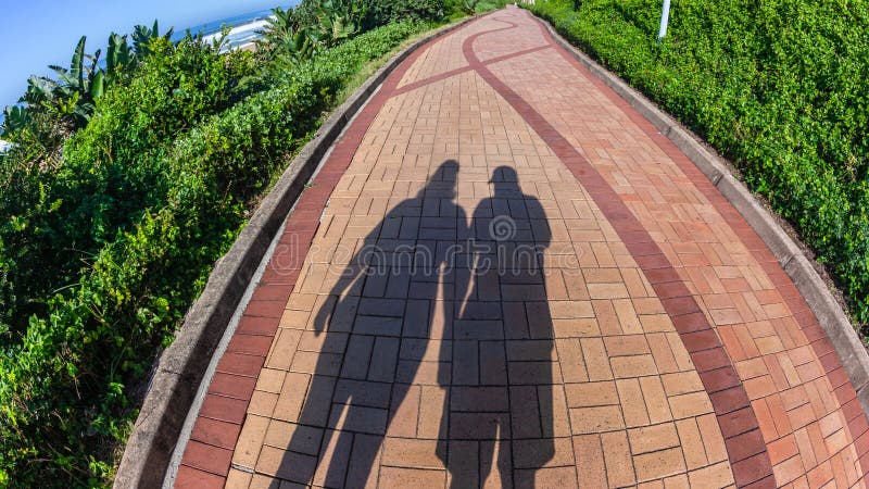 Man Woman Walking Path Shadow Reflections Stock Image - Image of ...