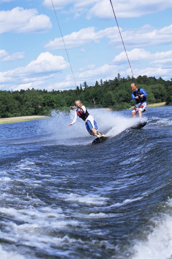 A young woman water skiing stock image. Image of watersports - 6077823