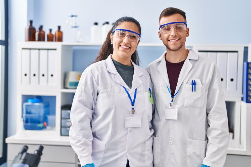 Man and Woman Wearing Scientist Uniform Standing at Laboratory Stock ...