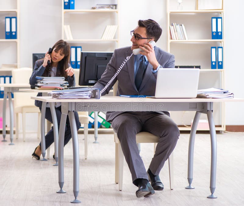 Man and Woman Working in the Office Stock Photo - Image of busy ...