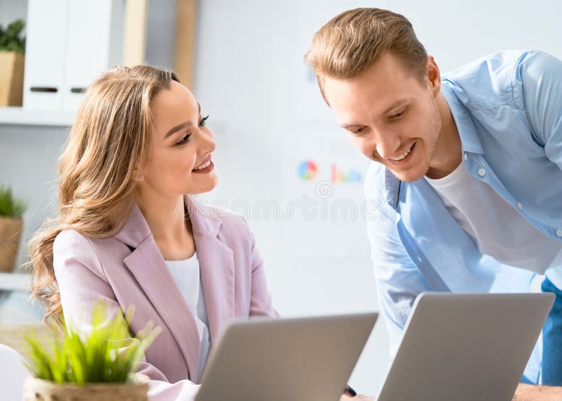 Man and Woman Working in the Office Stock Photo - Image of paper ...