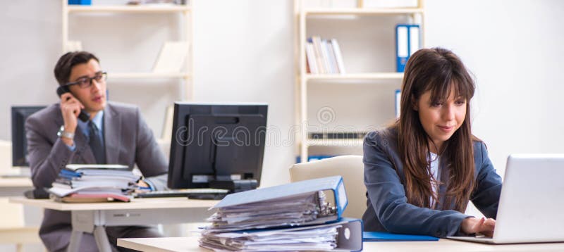 Man and Woman Working in the Office Stock Image - Image of ...