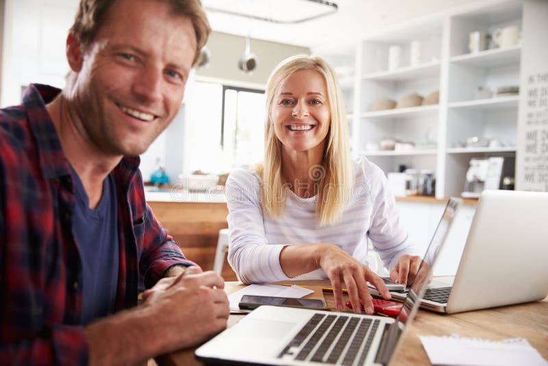 Man and Woman Working Together at Home Stock Image - Image of computer ...