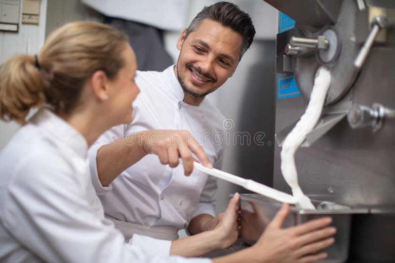 Man and Woman Working Together in Ice Cream Store Stock Photo - Image ...