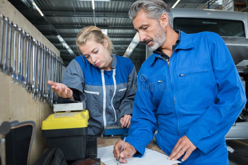 Man and Woman Choosing Tools Stock Photo - Image of indoors, change ...