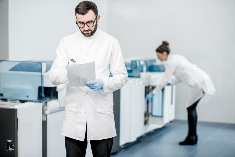 Medics Expertising Analyzer in the Laboratory Stock Photo - Image of ...