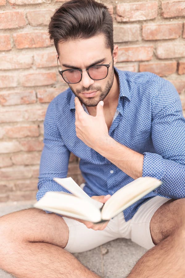 Man Wondering about the End of the Book he Reads Stock Image - Image of ...