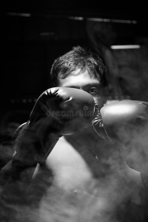 Man Wore Boxing Gloves with Smoke for Boxing Match. Stock Photo - Image ...
