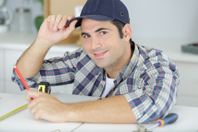 Man with Work Clothes and Cap Carpenter Stock Image - Image of ...