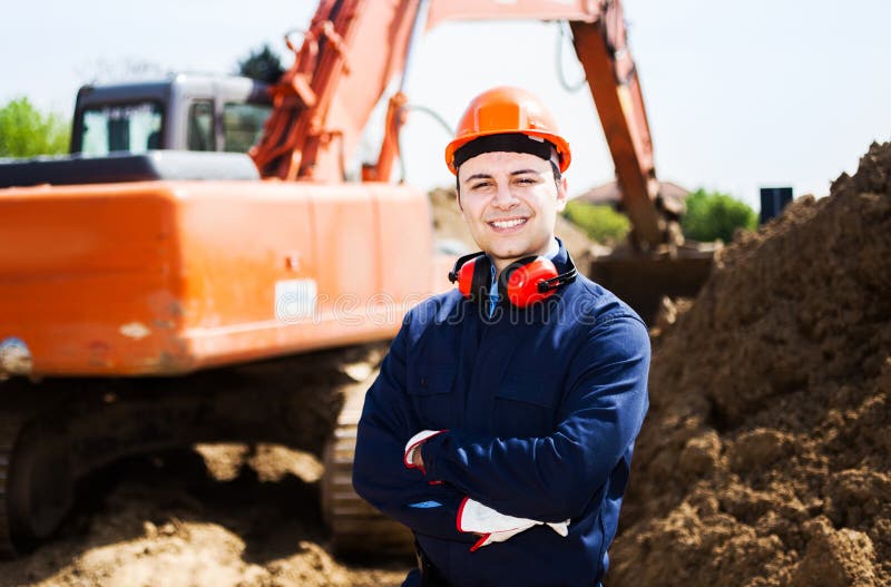 Man at Work in a Construction Site Stock Image - Image of folded, arms ...