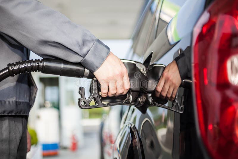 Man at Work at a Gas Station Stock Photo - Image of station, engine ...