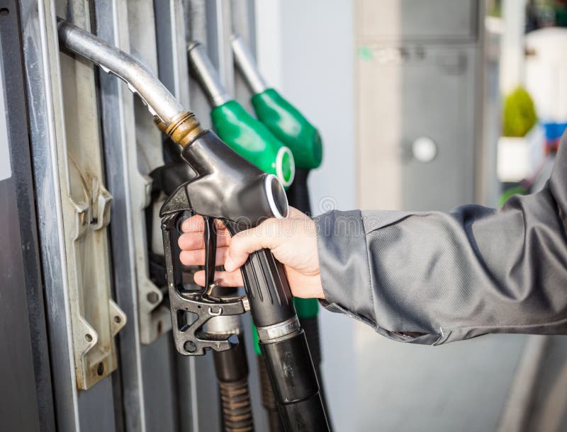 Man at Work at a Gas Station Stock Photo - Image of station, engine ...