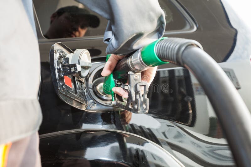 Man at Work at a Gas Station Stock Photo - Image of station, engine ...