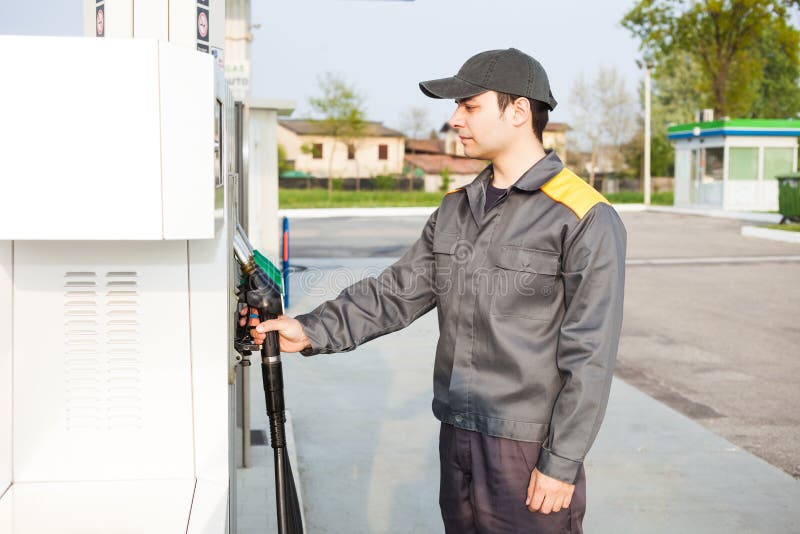 Man at Work at a Gas Station Stock Photo - Image of station, engine ...