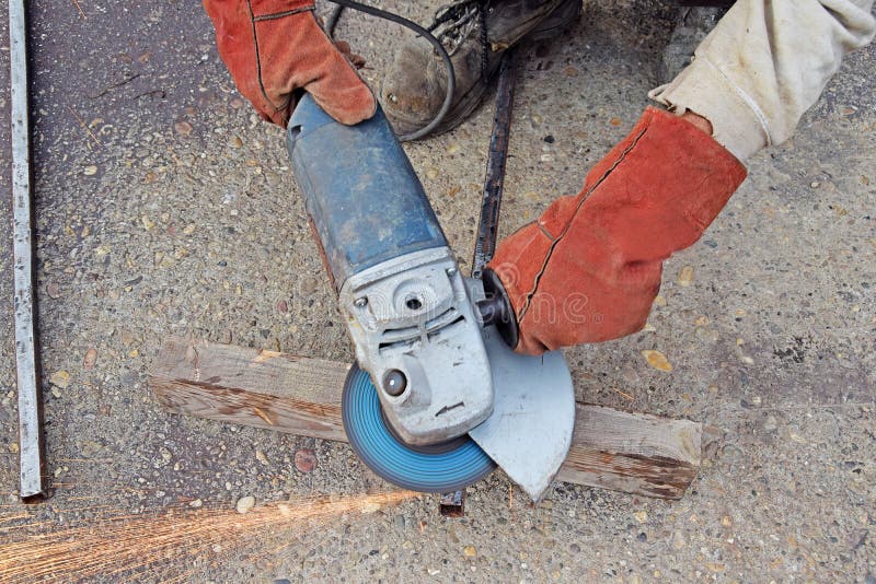 The Man at Work Grinds Grinder Stock Photo - Image of rods, grinder ...