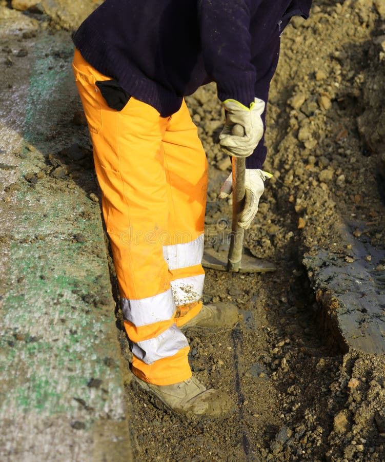 Man at Work with High Visibility Clothing while Working on a Roa Stock ...