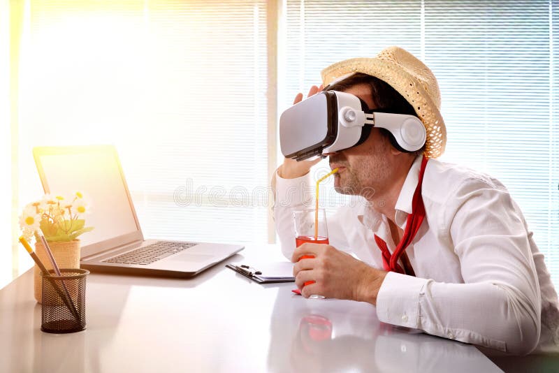 Man at Work Imagining His Vacation with Vr Glasses Drinking Stock Photo ...