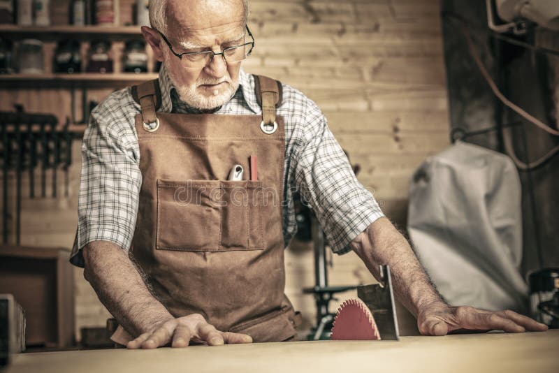 Man work at tablesaw stock photo. Image of senior, artisan - 117700276