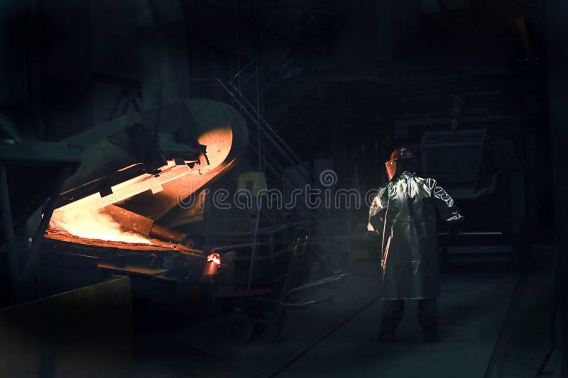 Man at Work. Worker Standing in Front of Furnace, Melting Steel Stock ...