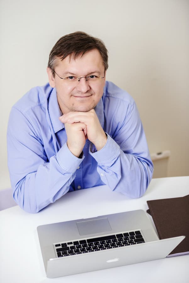 Man at work stock photo. Image of smiling, typing, businessman - 93319994