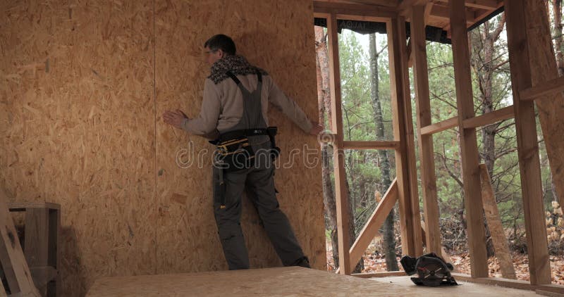 Man Worker Building Wooden Frame House Stock Video - Video of employee ...
