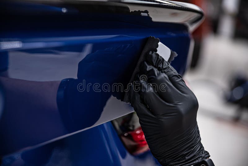 Man Worker of Car Detailing Studio Applying Ceramic Coating on Car ...