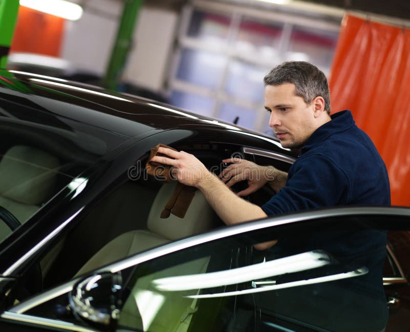 Man worker on a car wash stock photo. Image of luxury - 48893850