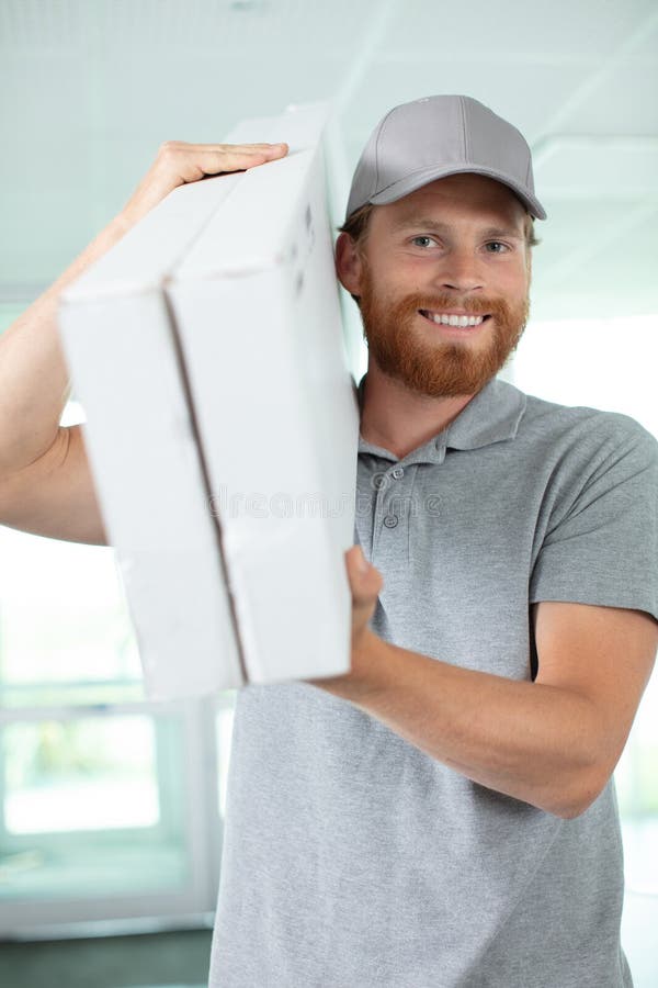Man worker carrying box stock image. Image of container - 279542483