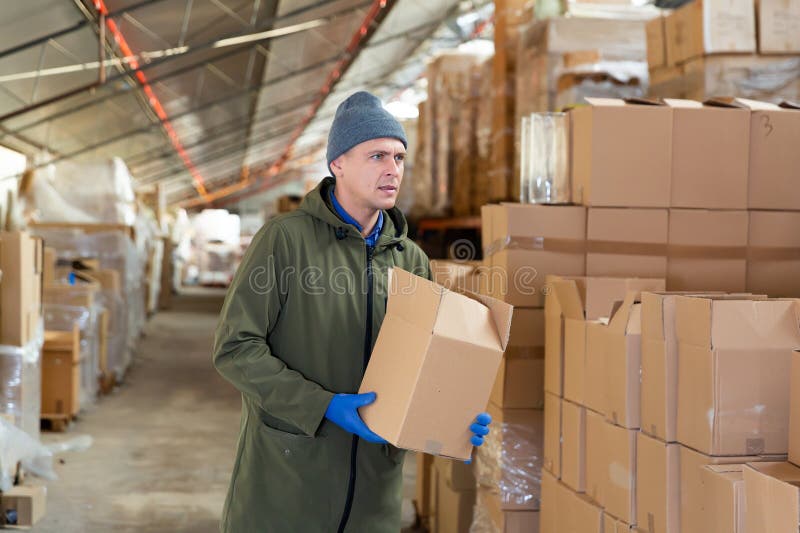 3,744 Cardboard Factory Man Working Stock Photos - Free & Royalty-Free ...