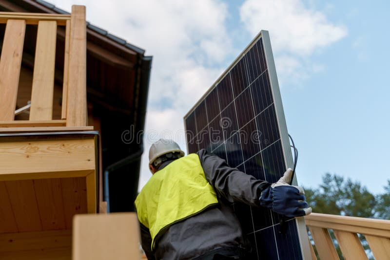 Man Worker Carrying Solar Panel for Installing Solar Modul System on ...